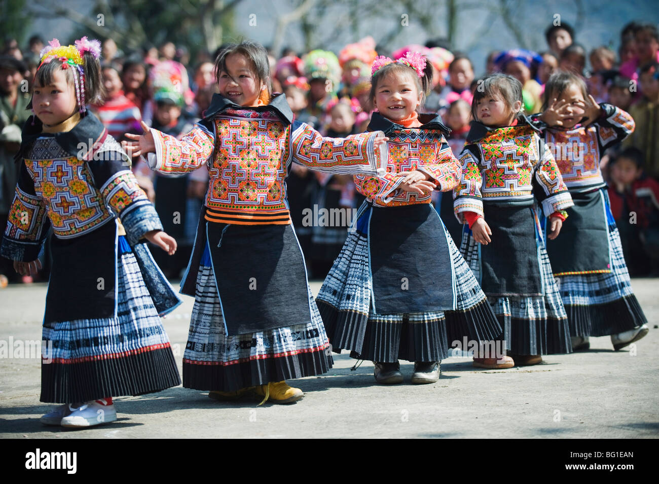 Girls in ethnic costume at a 4 Seals Miao lunar New Year festival ...