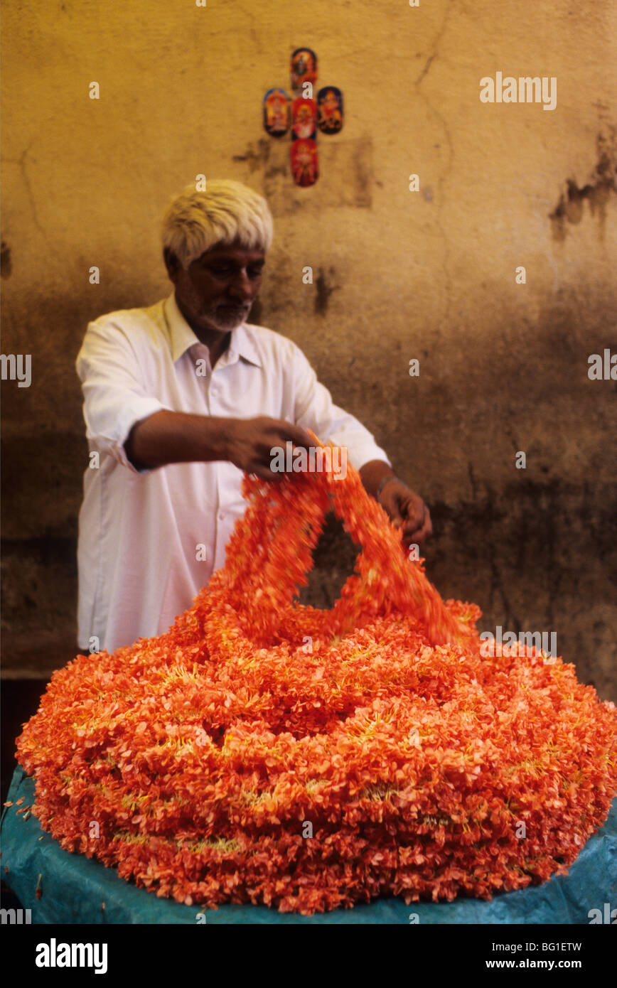 A flower merchant in the flower market, Mysore, India Stock Photo - Alamy