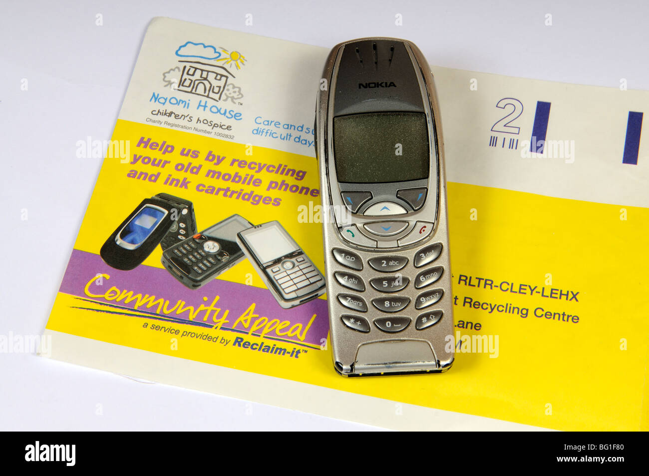 Recycling old mobile phones for charity envelope Stock Photo - Alamy