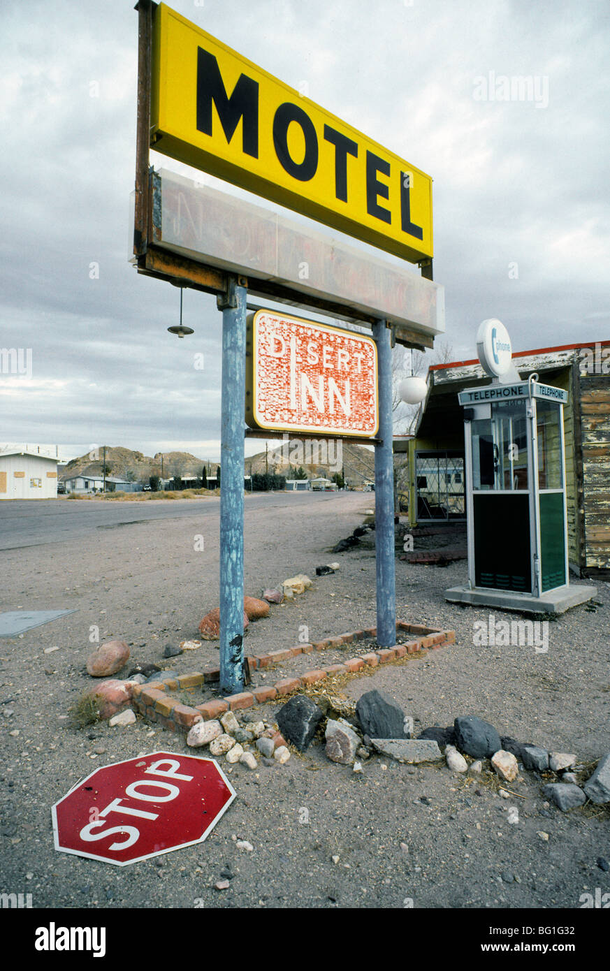 The sign for an abandoned motel and fallen stop sign, Nevada Stock ...