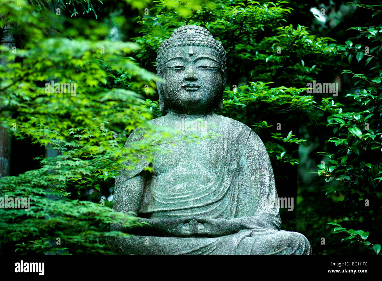 A stone statue of a sitting Buddha, Kyoto, Japan Stock Photo - Alamy