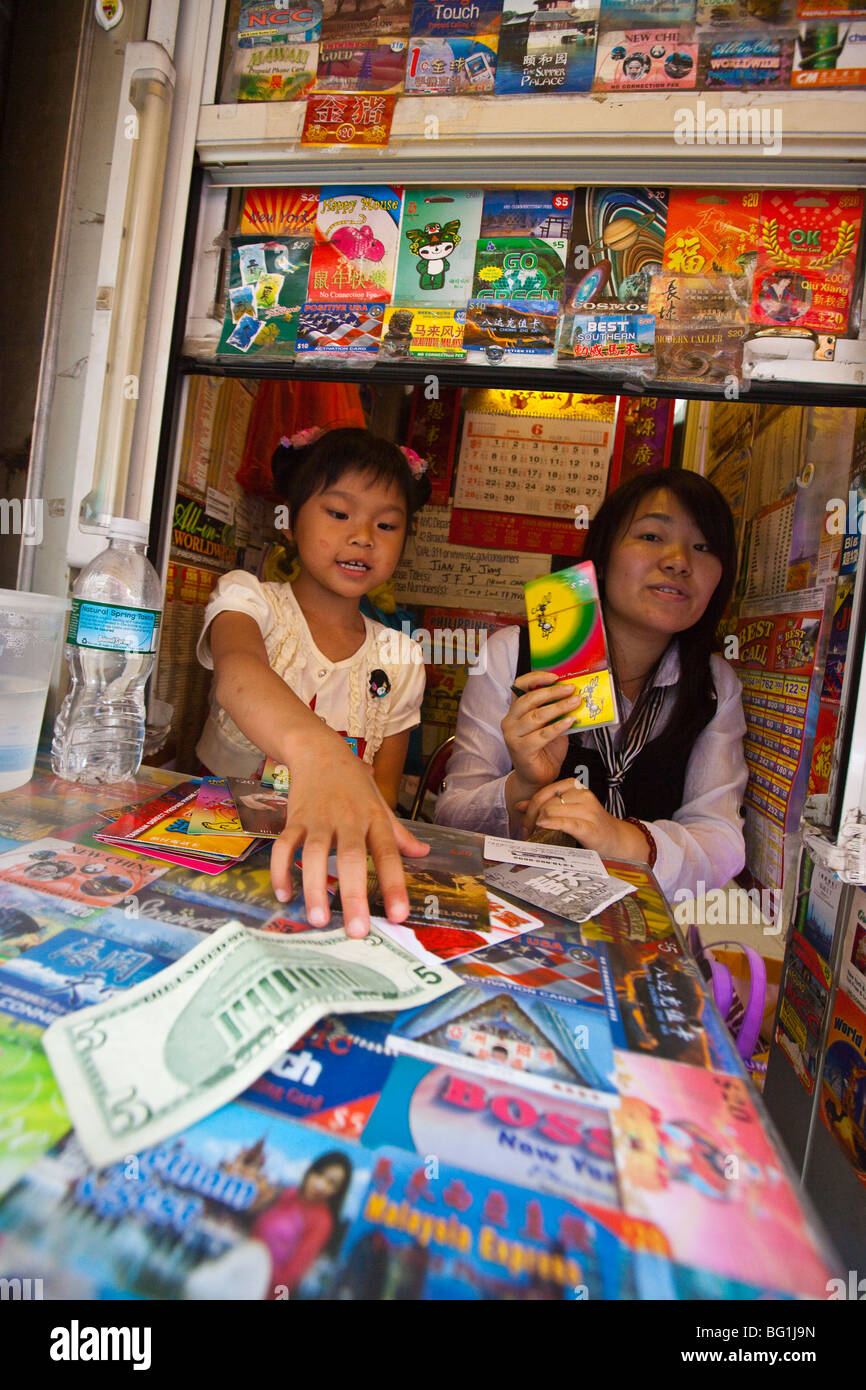 Telephone calling card vendor in Chinatown in Manhattan New York Stock ...