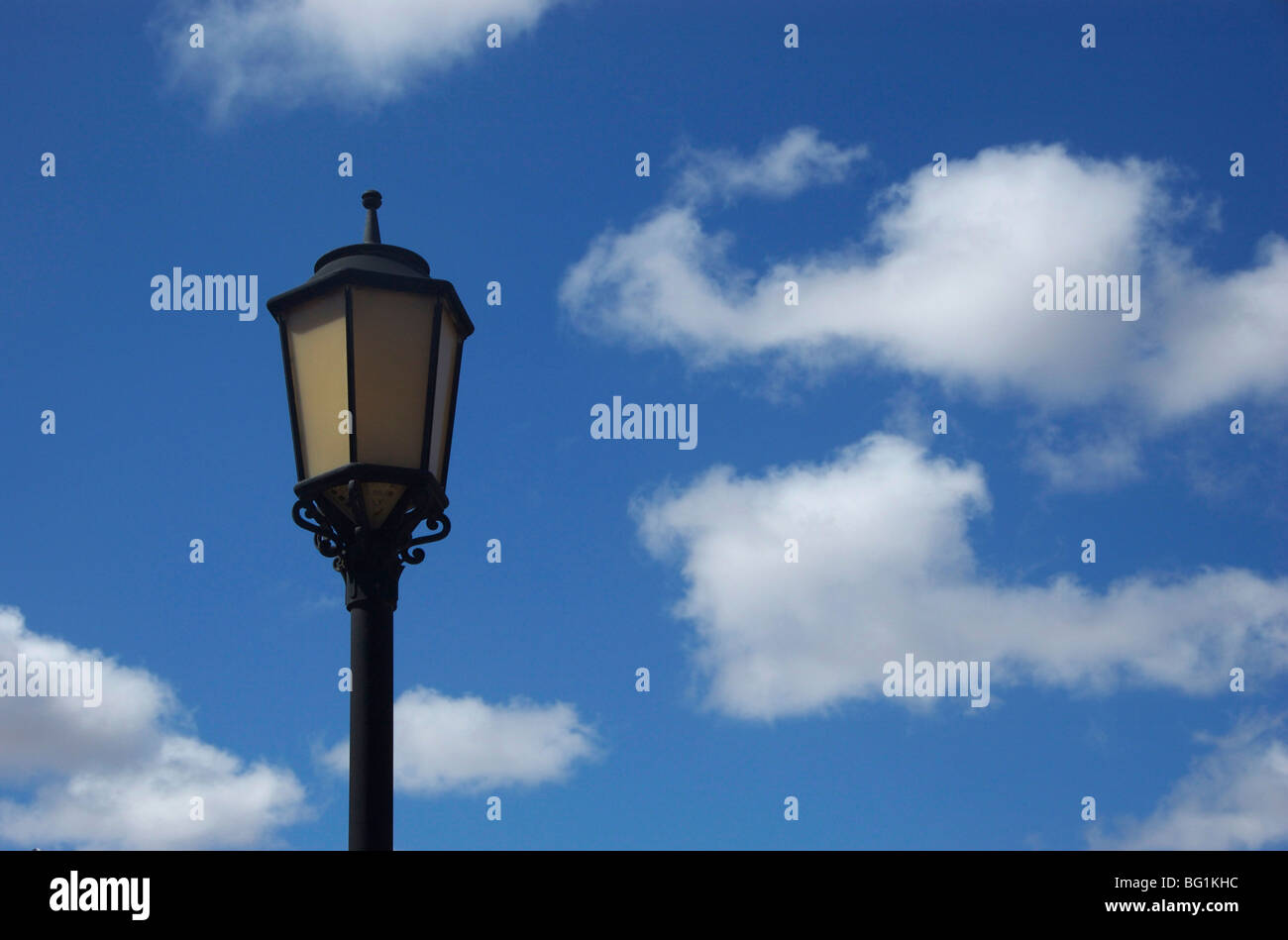 Street light lamp blue sky white couds Stock Photo - Alamy