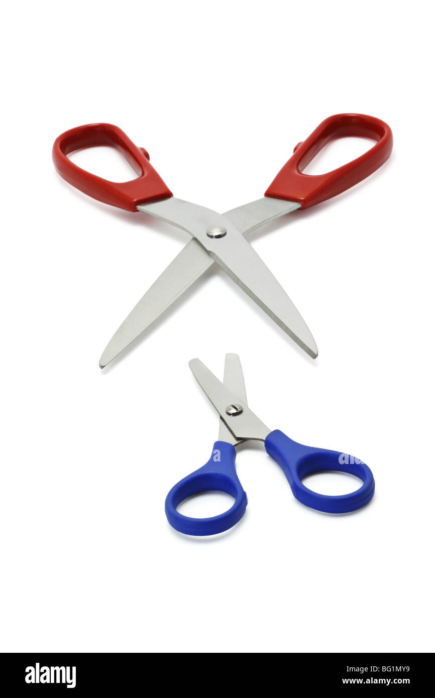 Blue and red scissors on white background Stock Photo - Alamy