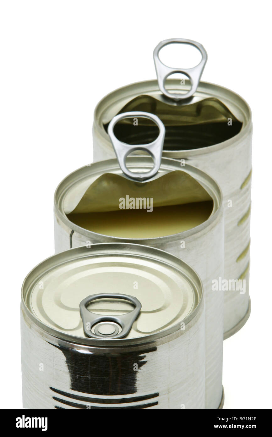 Unopen, opened and empty tin cans of creamer Stock Photo - Alamy