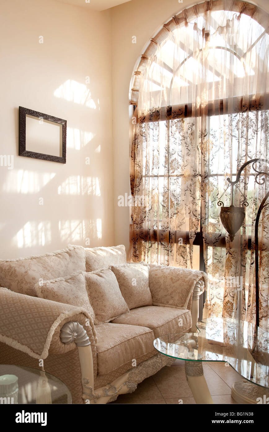 Modern interior with soft beside the window Stock Photo - Alamy