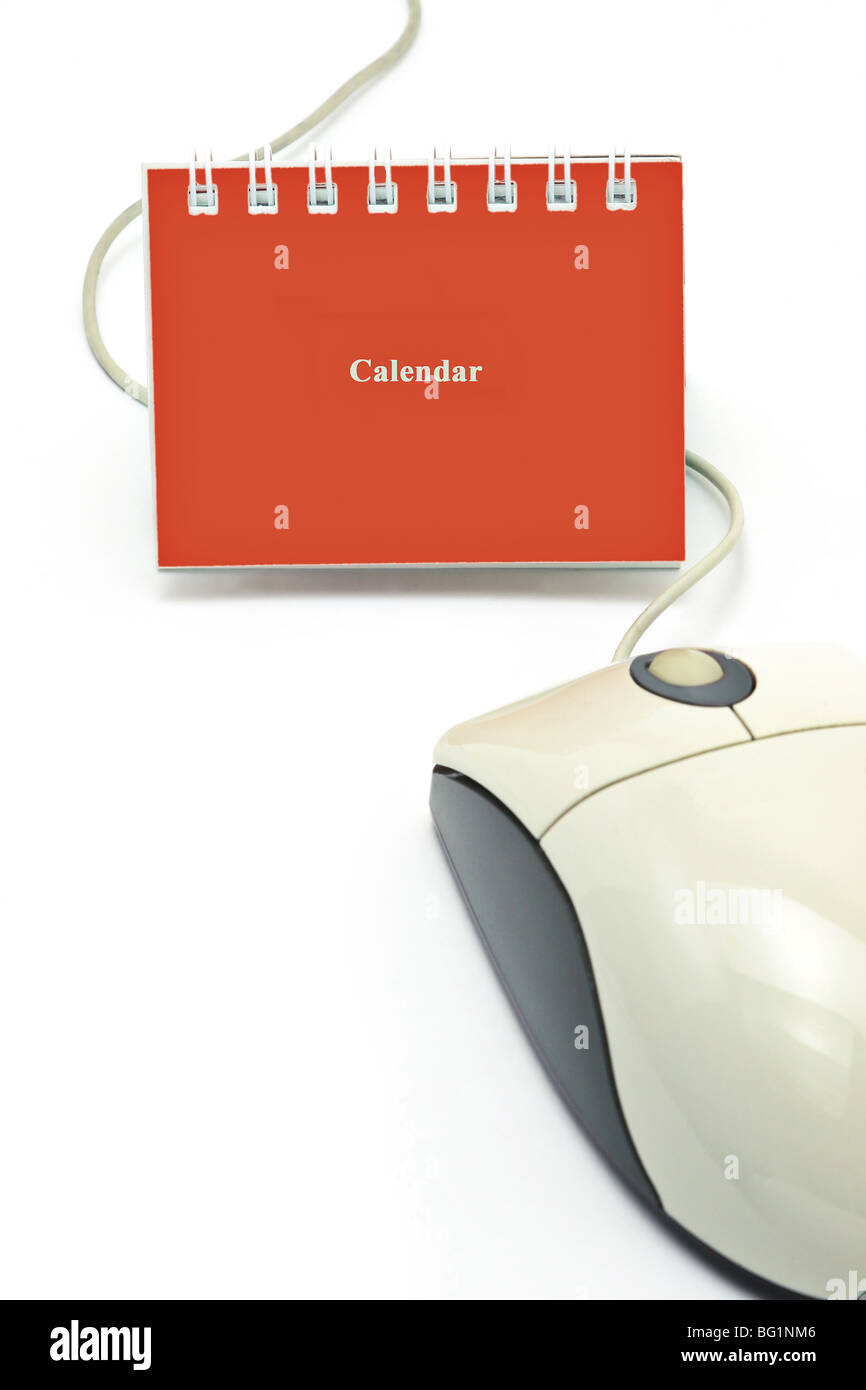Year 2008 mini desktop calendar and computer mouse Stock Photo - Alamy