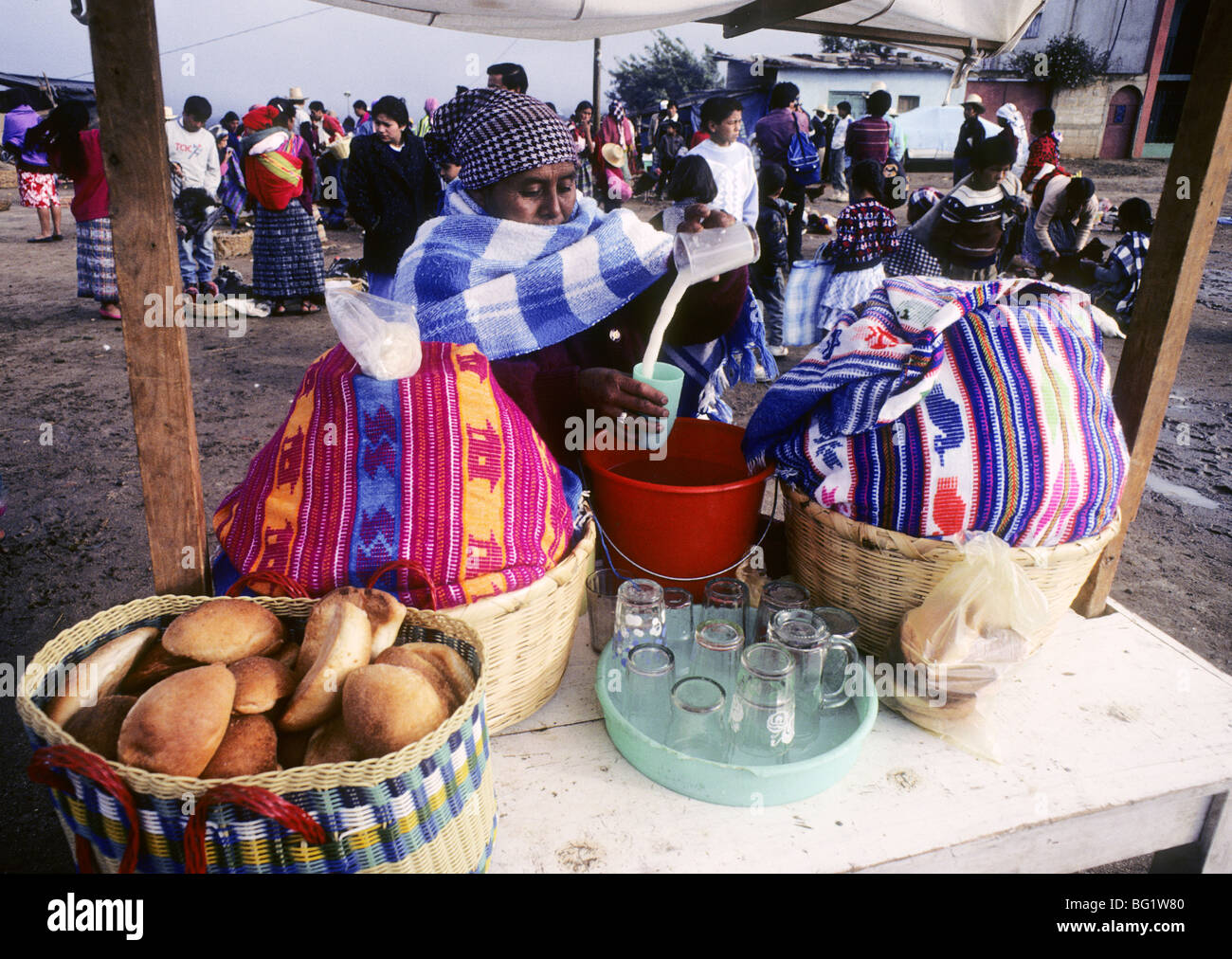 A proprietor of a breakfast food stall pours milk at the San Francisco ...
