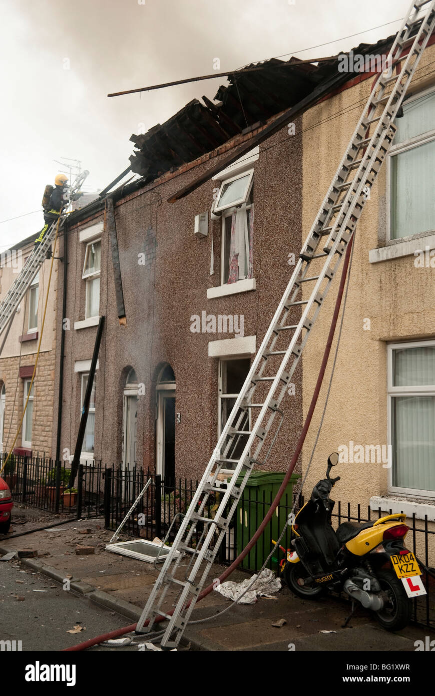 Terraced house fire following gas explosion Stock Photo - Alamy