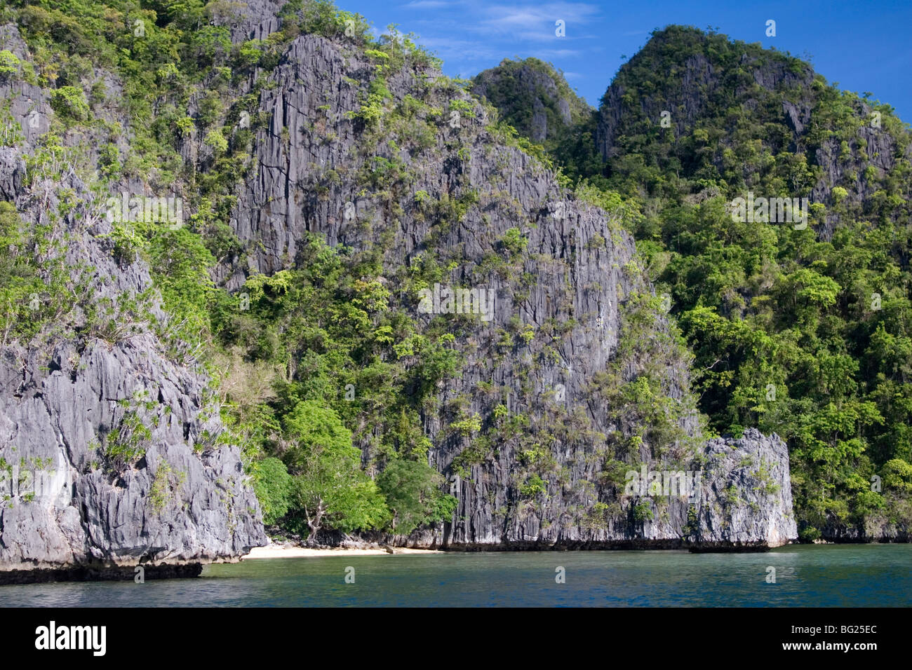 Banul Beach, a tiny beach that cut in a crease in the cliff, at Coron ...