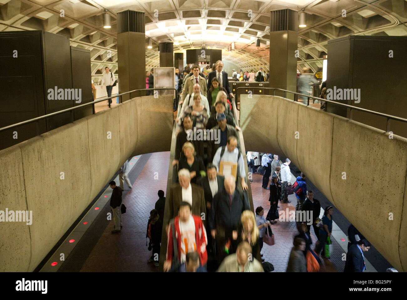 Commuters rushing to work on the metrorail underground rail system ...
