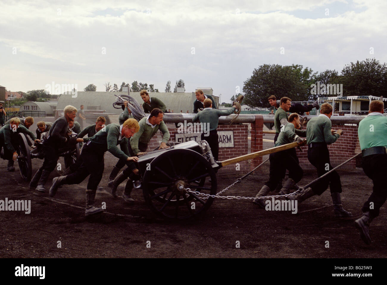 Members of the Fleet Air Arm practice for the Field Gunners Event at ...