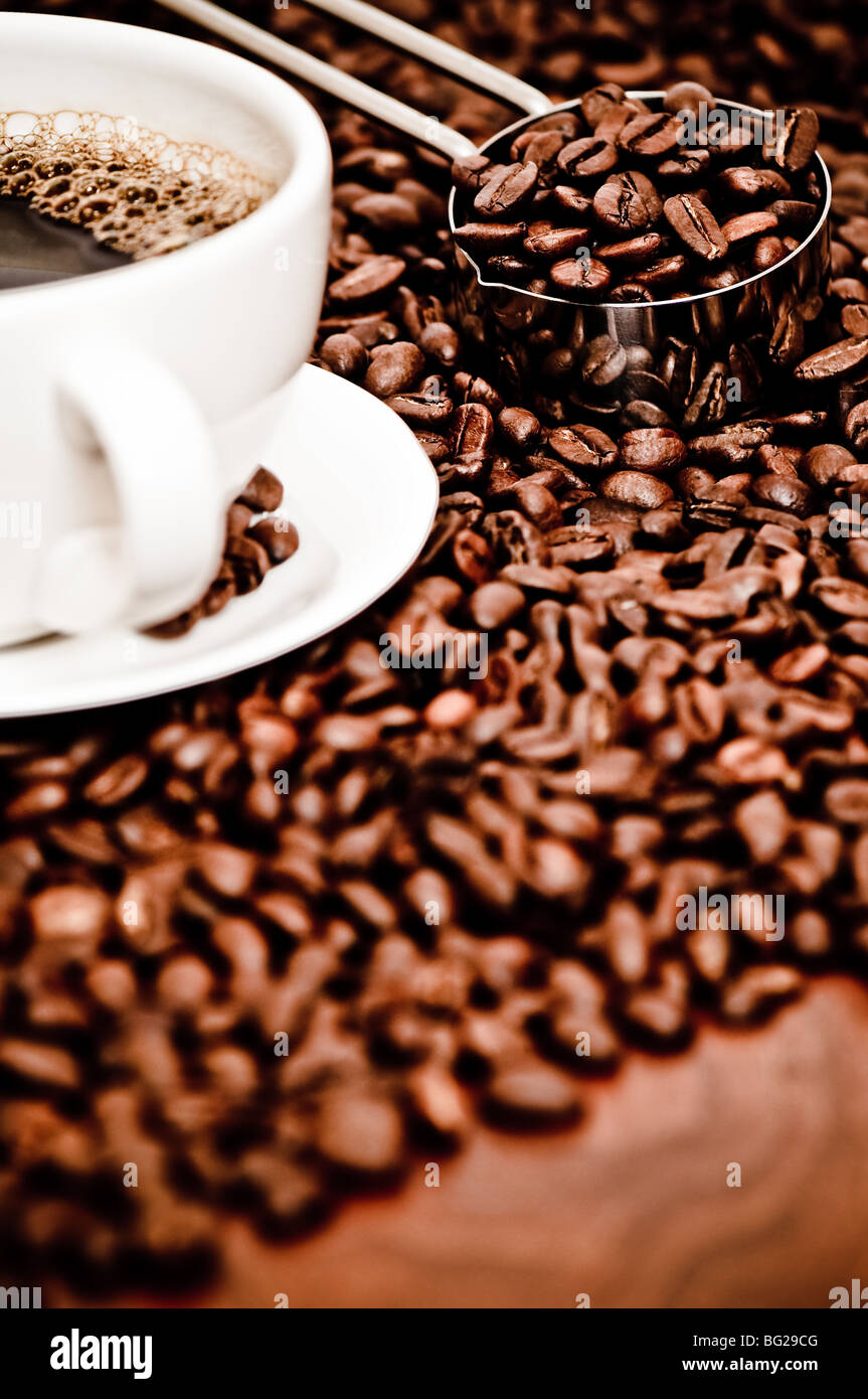 Coffee beans and coffee cup Stock Photo - Alamy