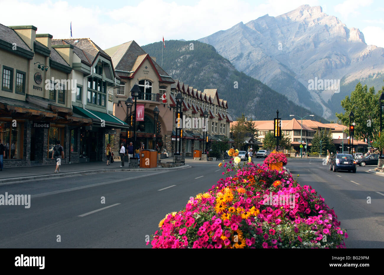 view of banff village city center and mountains on the background and ...