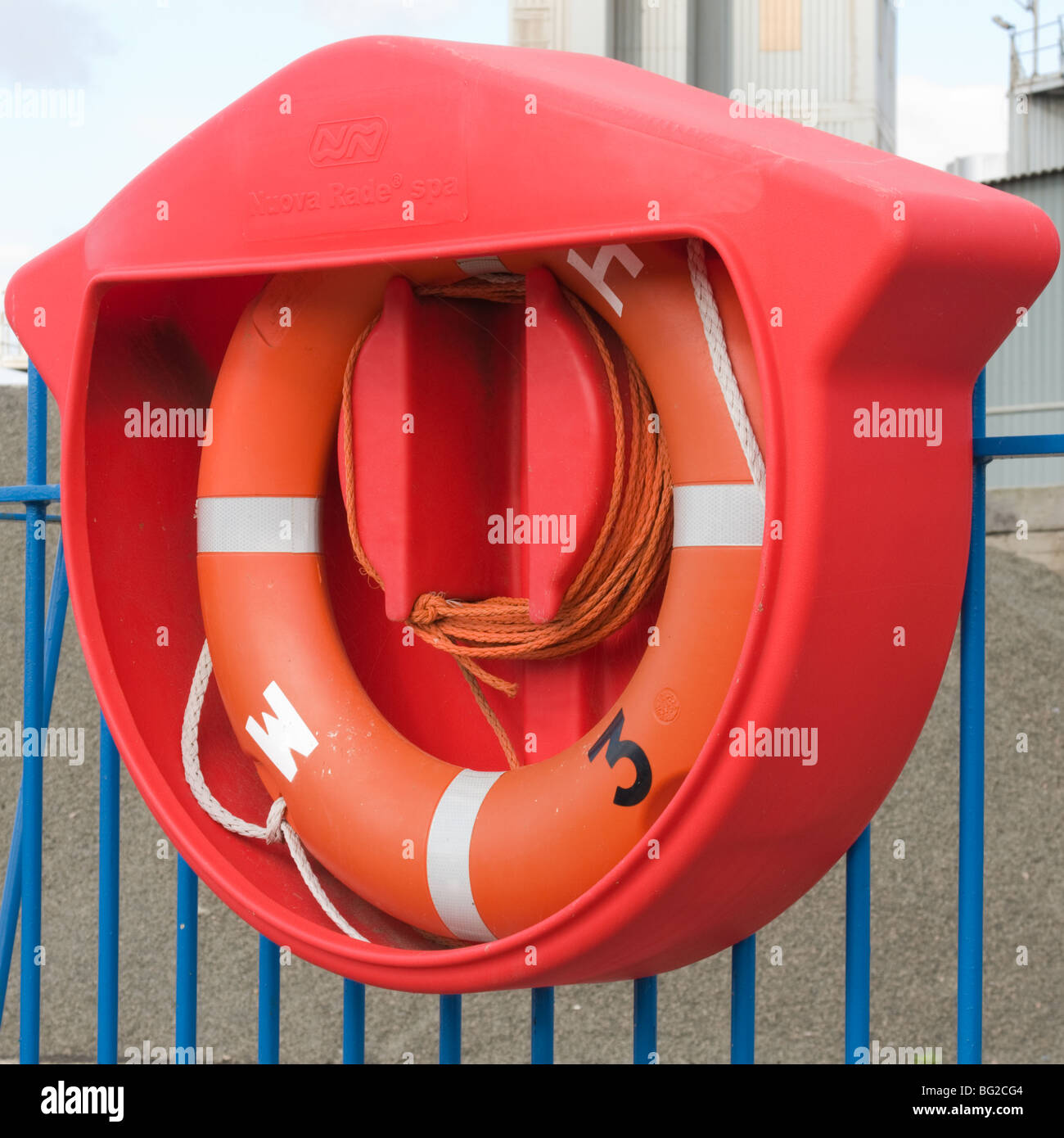 Large red life-belt in it's holder, life buoy, buoyancy aid Stock Photo ...