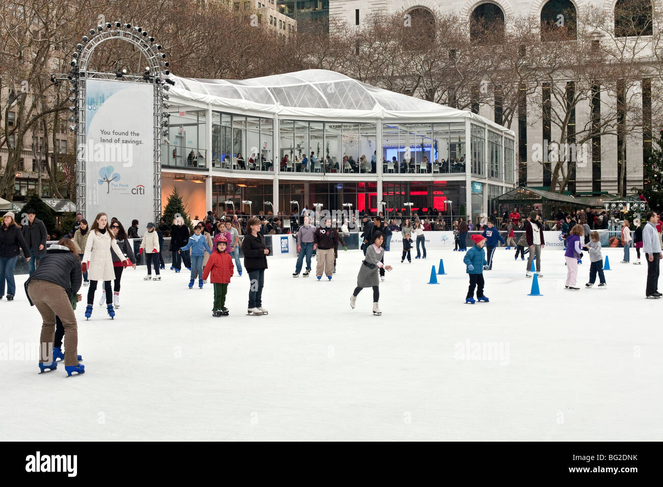 multicultural crowd, children & adults & spectators in rink side ...