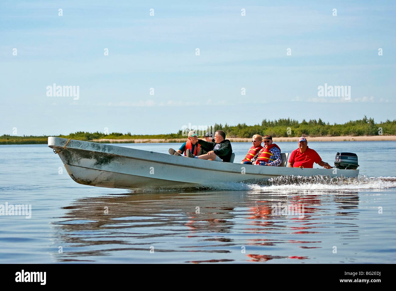 Boating on the Moose River, heading for James Bay. Ontario, Canada ...
