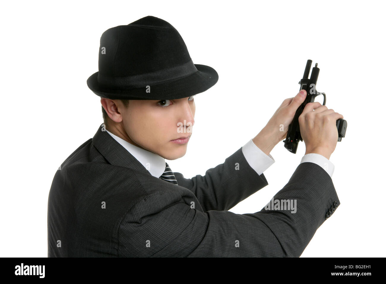 Classic mafia portrait, man with black suit and gun, isolated on white ...