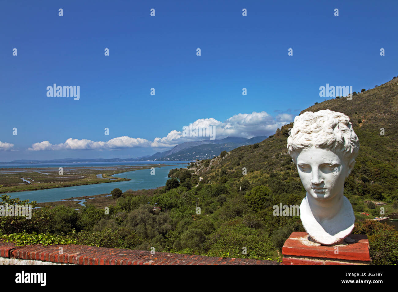 Statue on wall overlooking Bistrice River and Butrint National Park ...