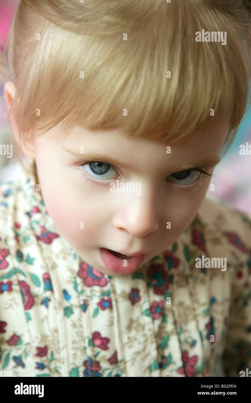 Beautiful toddler little girl with funny angry gesture expression Stock ...