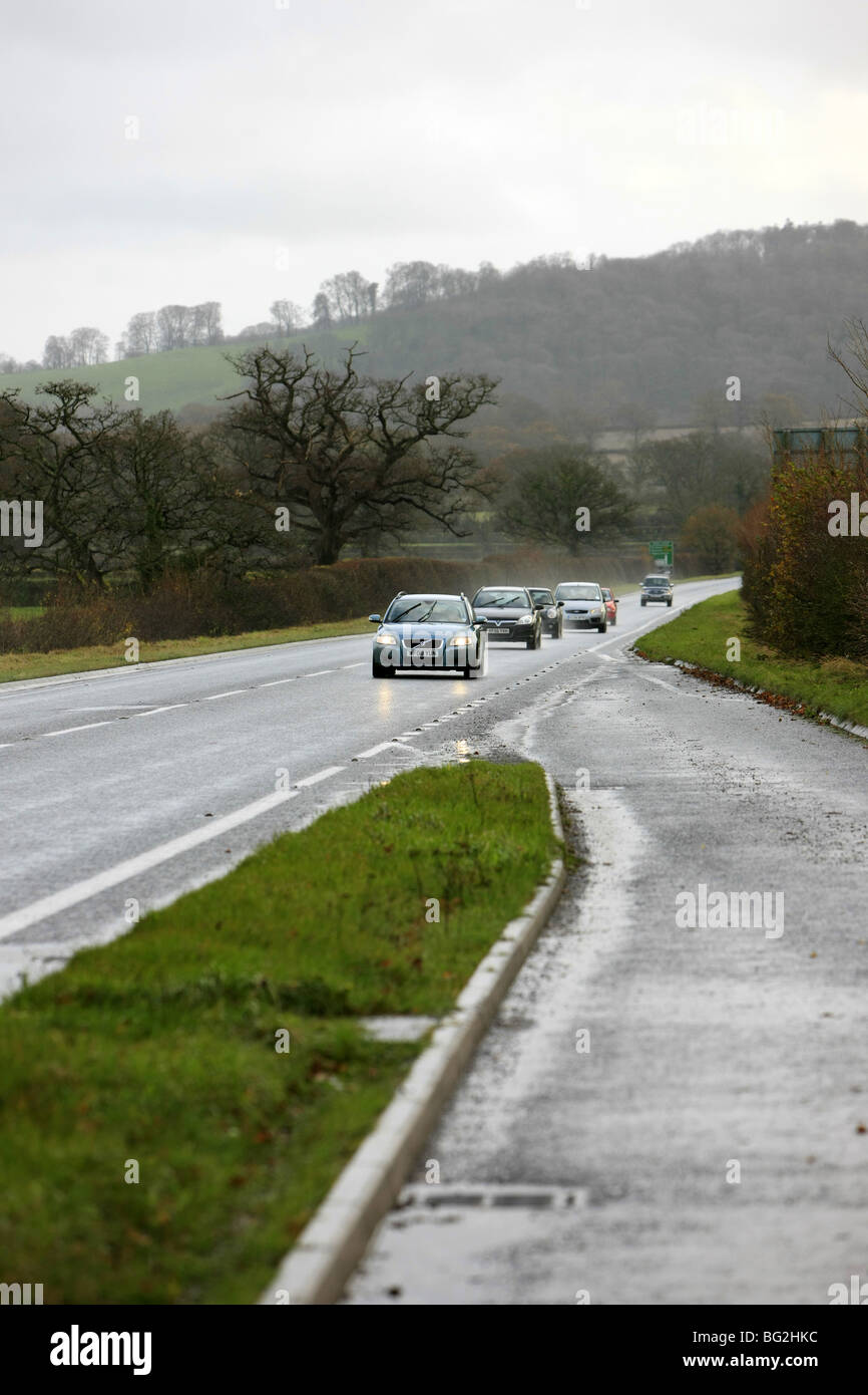 Vehicles on wet roads hi-res stock photography and images - Alamy