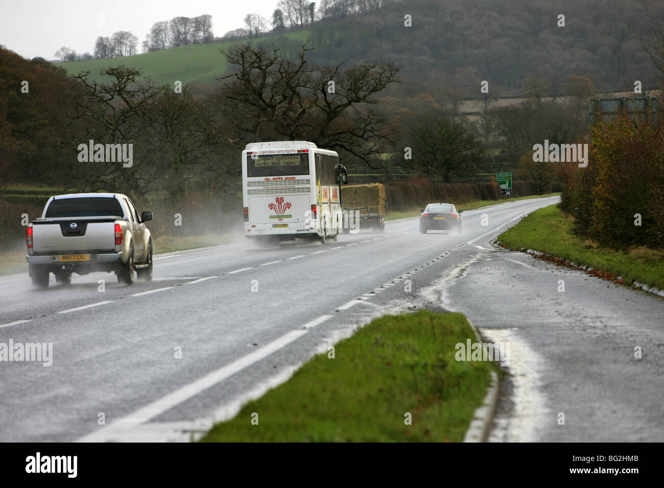Vehicles driving in wet weather hi-res stock photography and images - Alamy