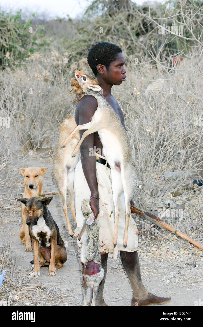 Africa, Tanzania, Lake Eyasi, Hadza hunters with bow and arrow. Hadza ...