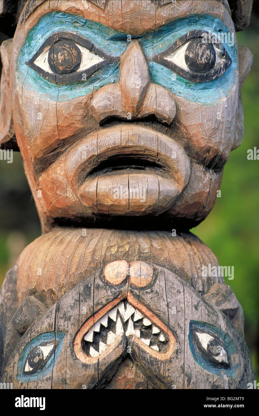 Totem poles in Alaska Stock Photo - Alamy