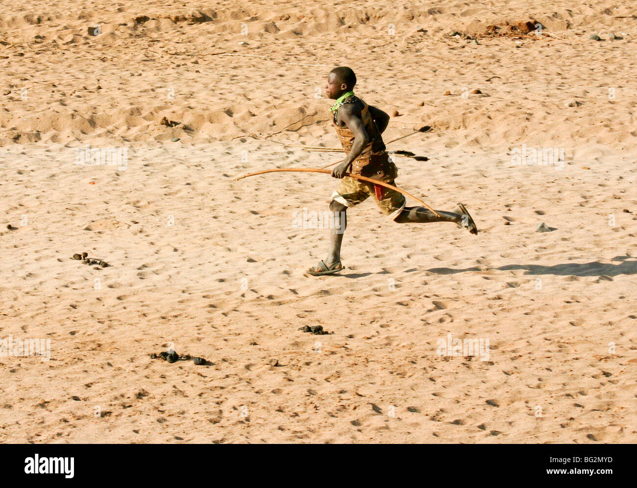 Africa, Tanzania, Lake Eyasi, Hadza hunters with bow and arrow. Hadza ...
