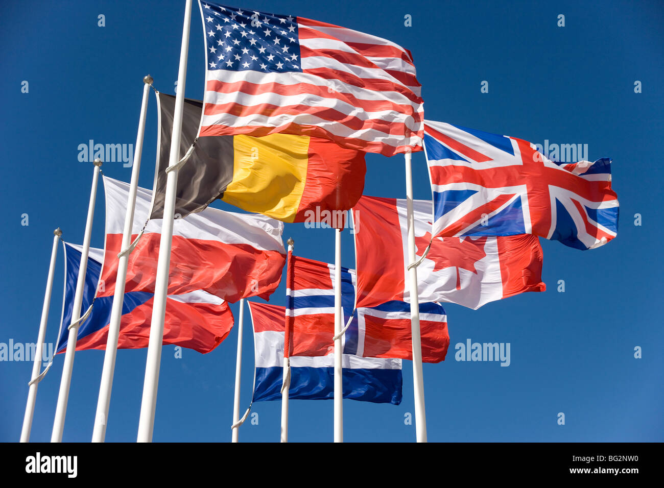 Flags of the nations that took part in D day in front of the 6 June ...