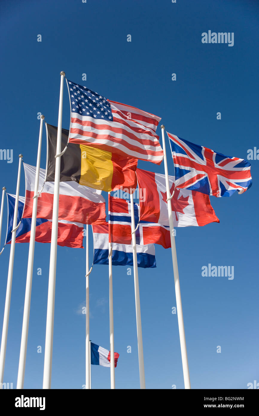 Flags of the nations that took part in D day in front of the 6 June ...
