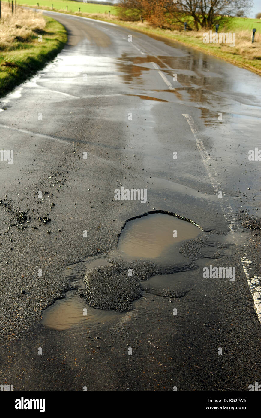 Potholes Road Surface Stock Photo - Alamy