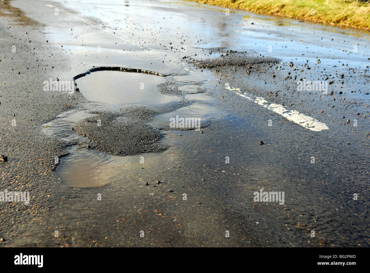 Potholes on country road hi-res stock photography and images - Alamy