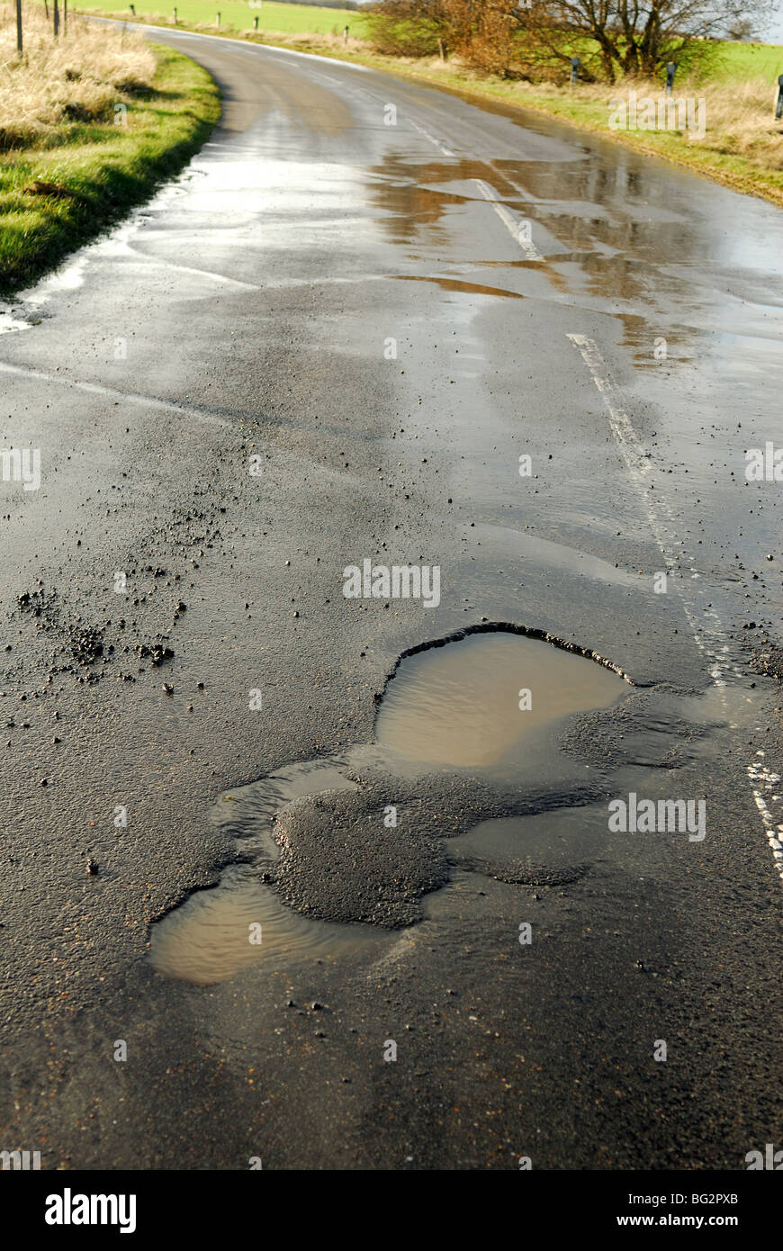 Potholes Road Surface Stock Photo - Alamy