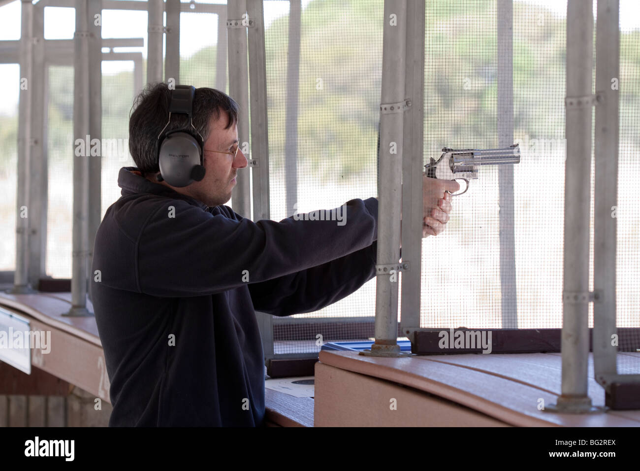 Man shooting 686 revolver at Los Altos Rod and Gun Club outdoor gun ...