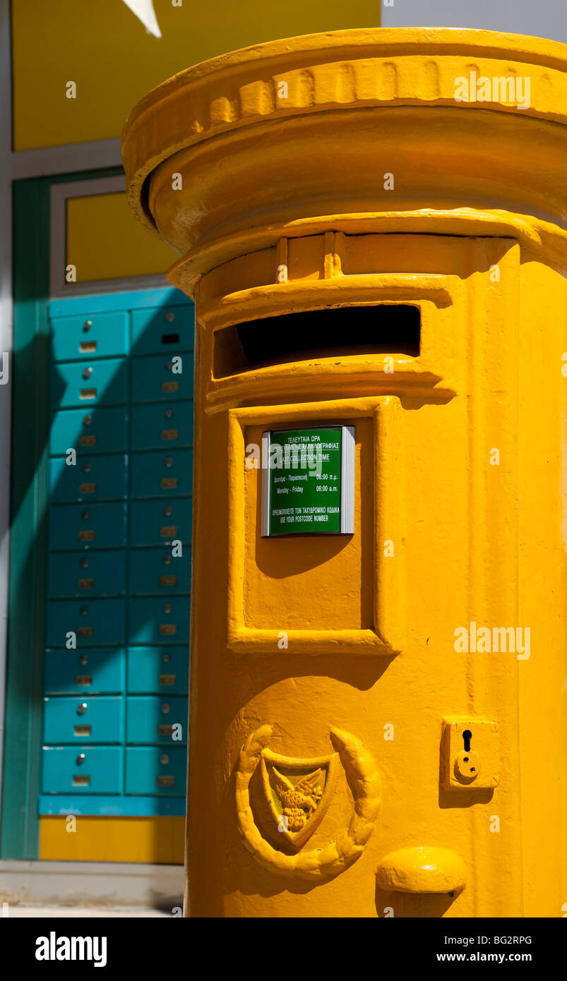 Traditional 'retro' yellow postbox in village of Polis, Cyprus Stock ...