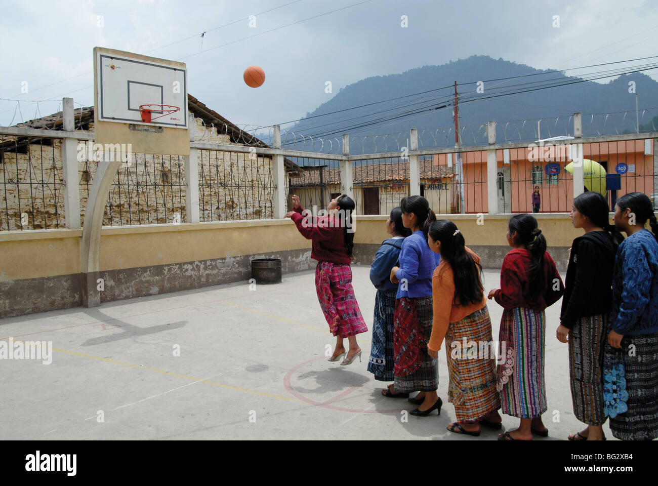 Guatemala.Native Mayan child workers playing basketball on their day ...
