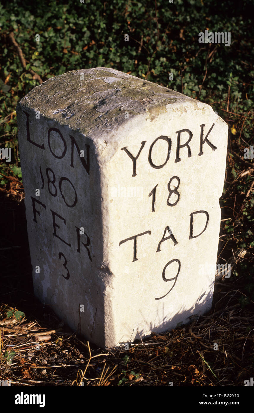 old fashioned stone road marker giving distances to York,Tadcaster ...