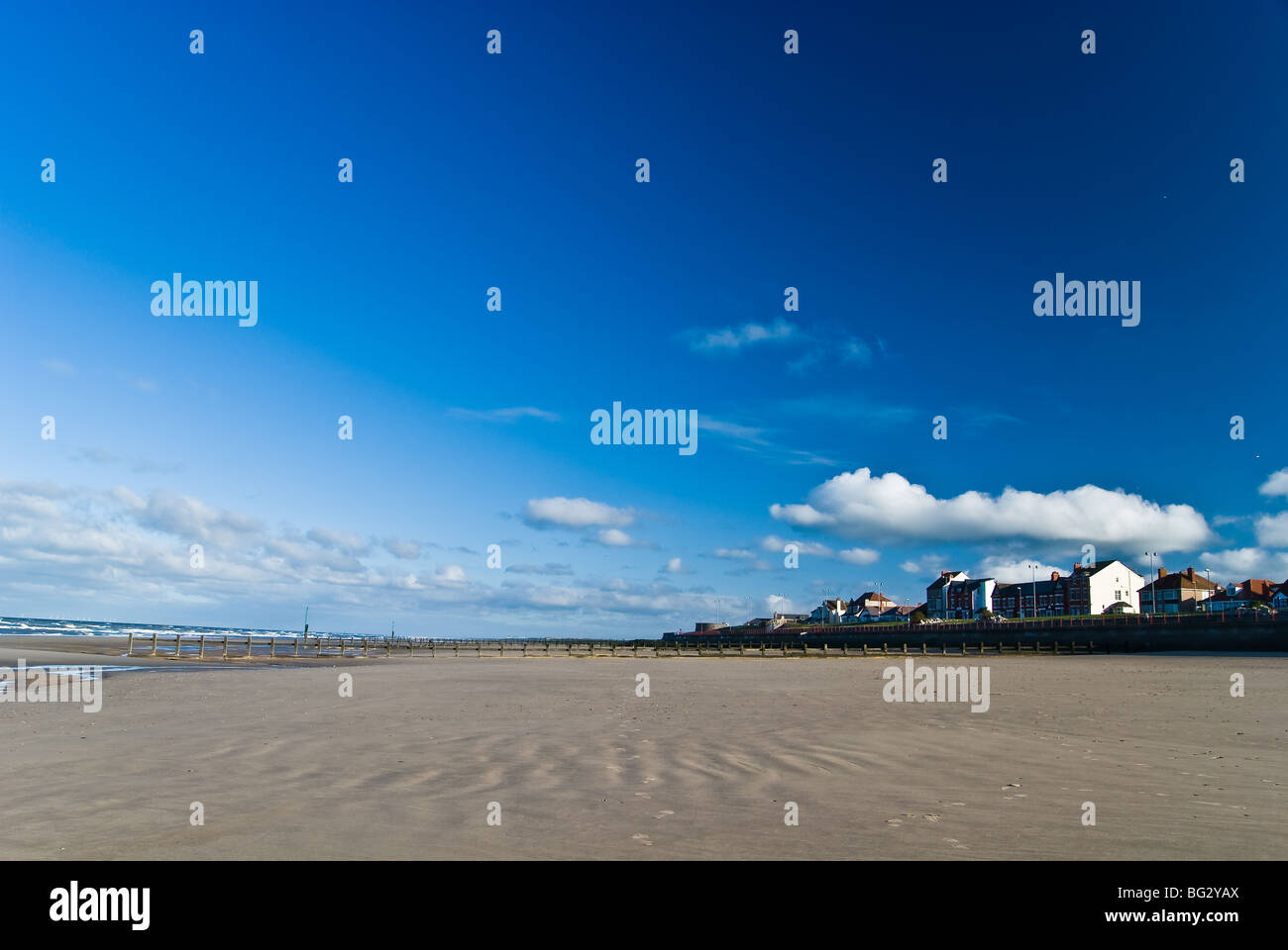 Beach, promenade and sky Stock Photo - Alamy