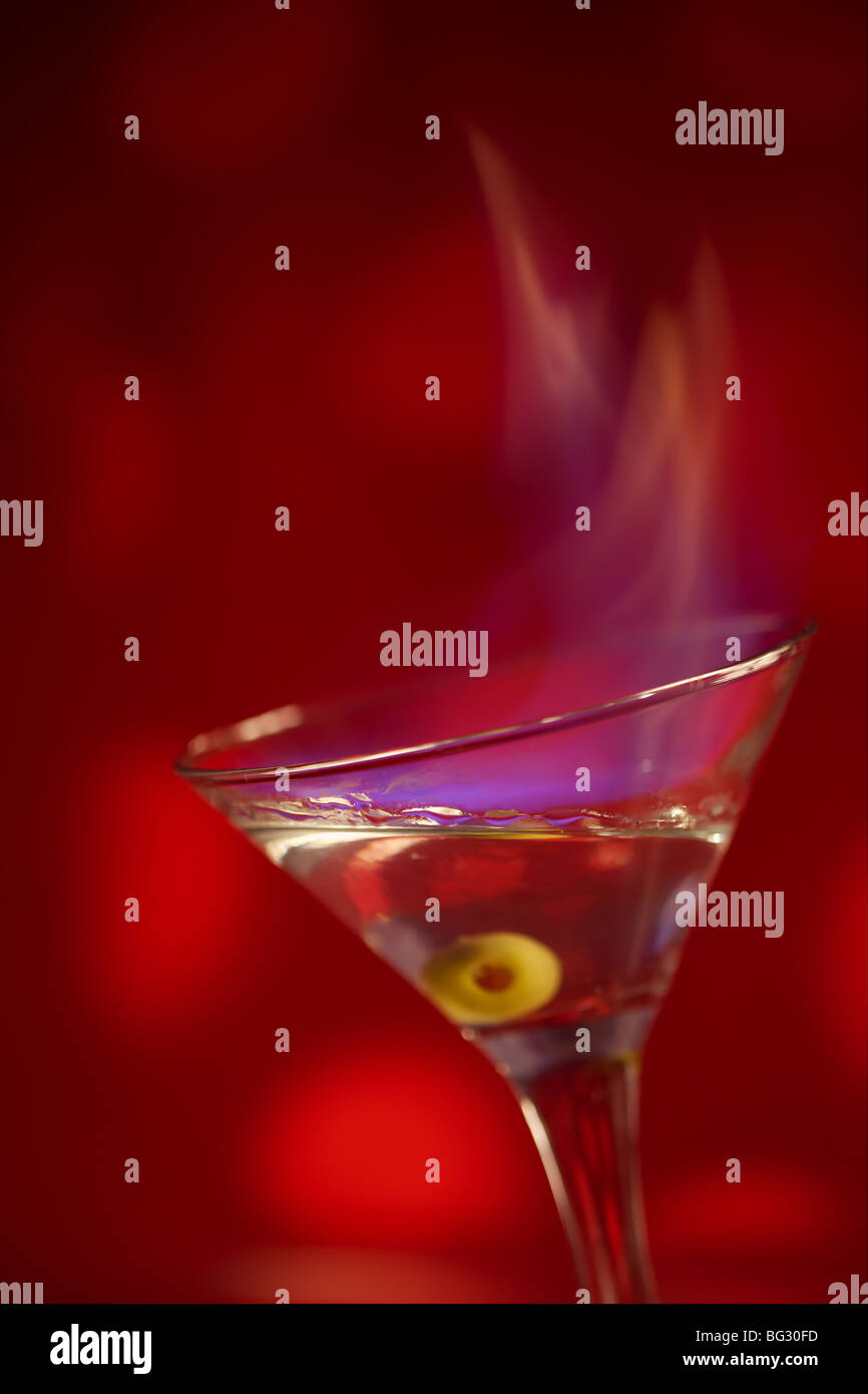 Blue flame of burning alcoholic drinks on a black background Stock ...