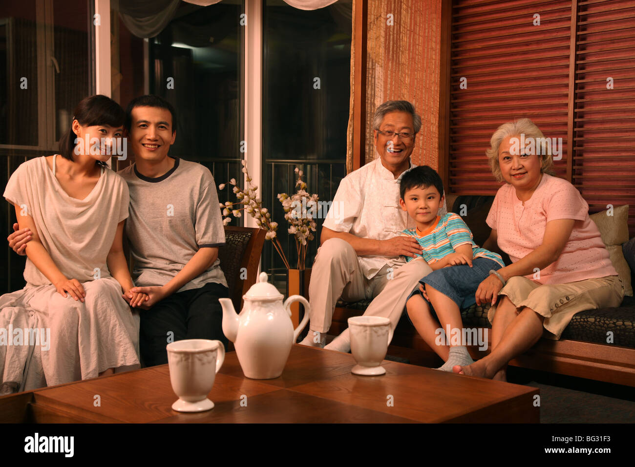 multi-generation family at home Stock Photo - Alamy