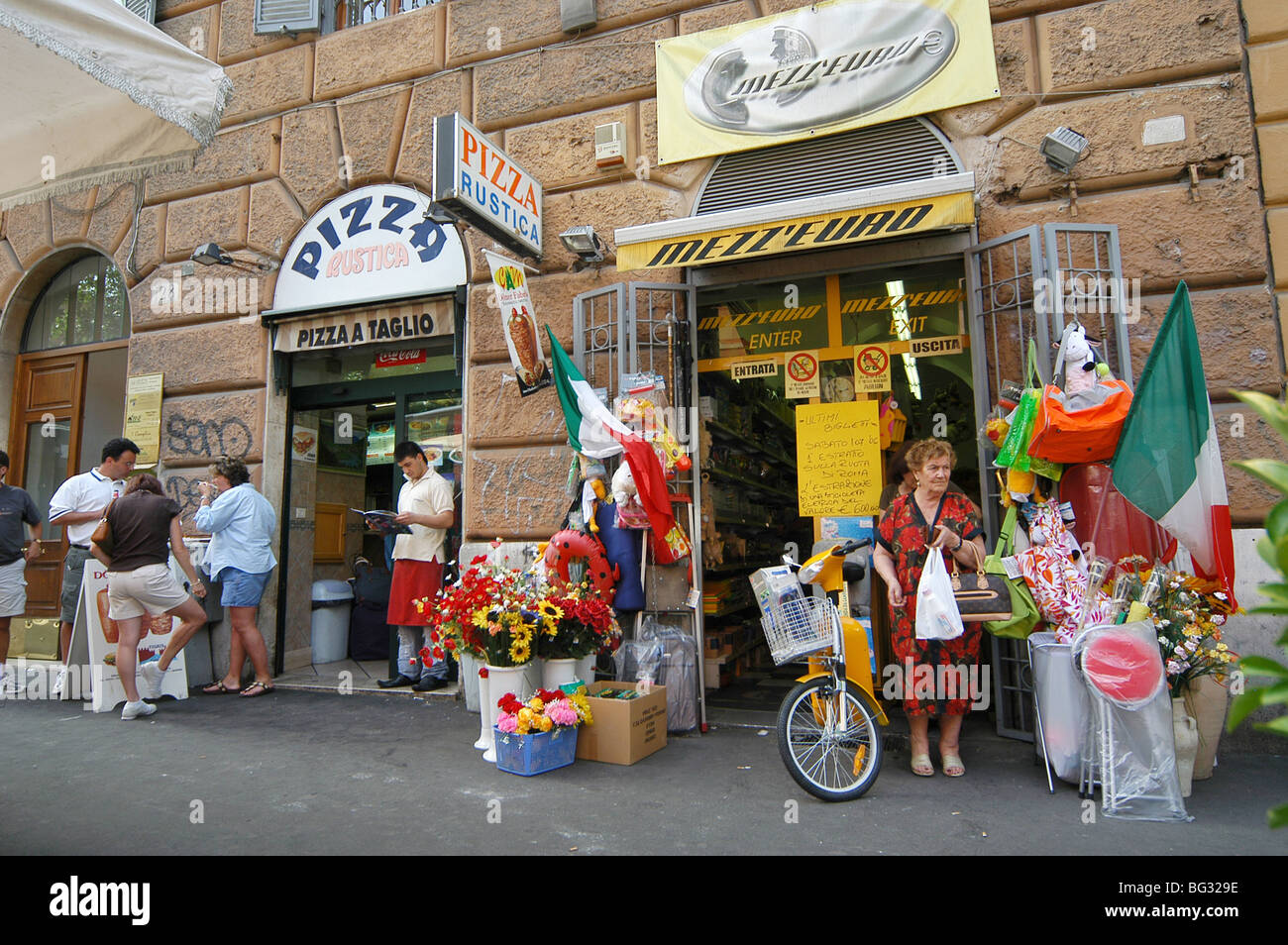shops in a street in Rome Stock Photo - Alamy