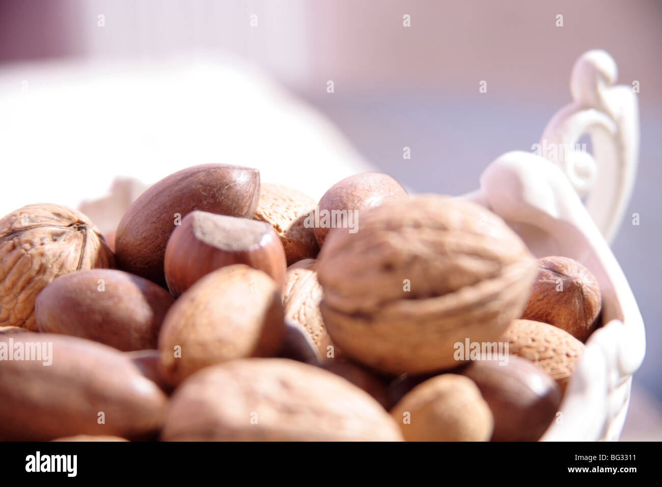 Bowl of nuts Stock Photo - Alamy