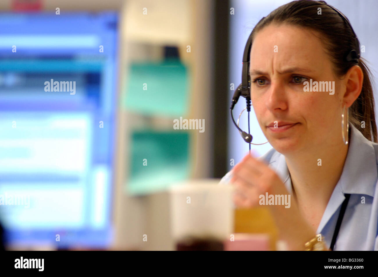 Royalty free photograph of customer helpline assistant talking to ...