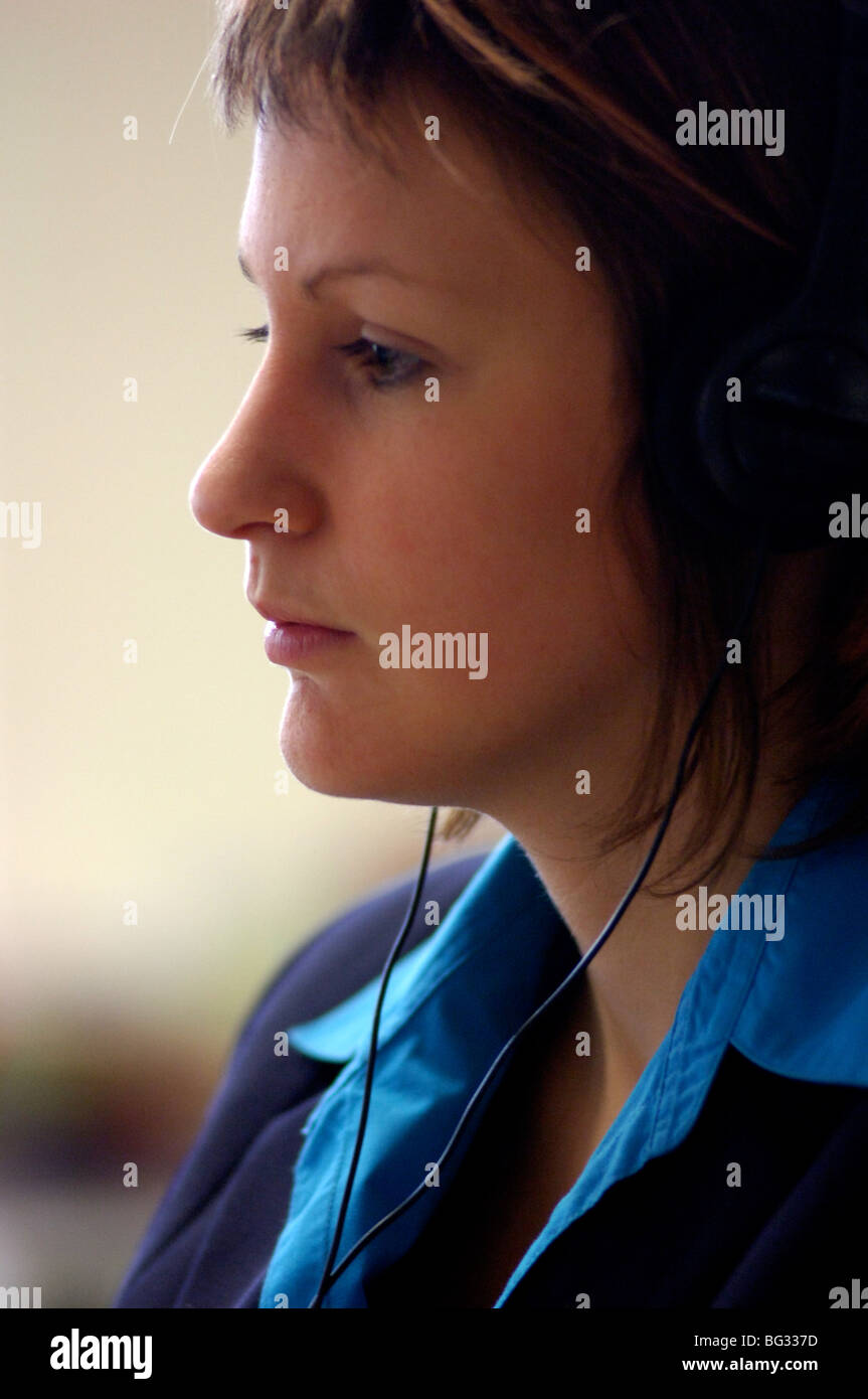 Royalty free photograph of customer helpline assistant talking to ...