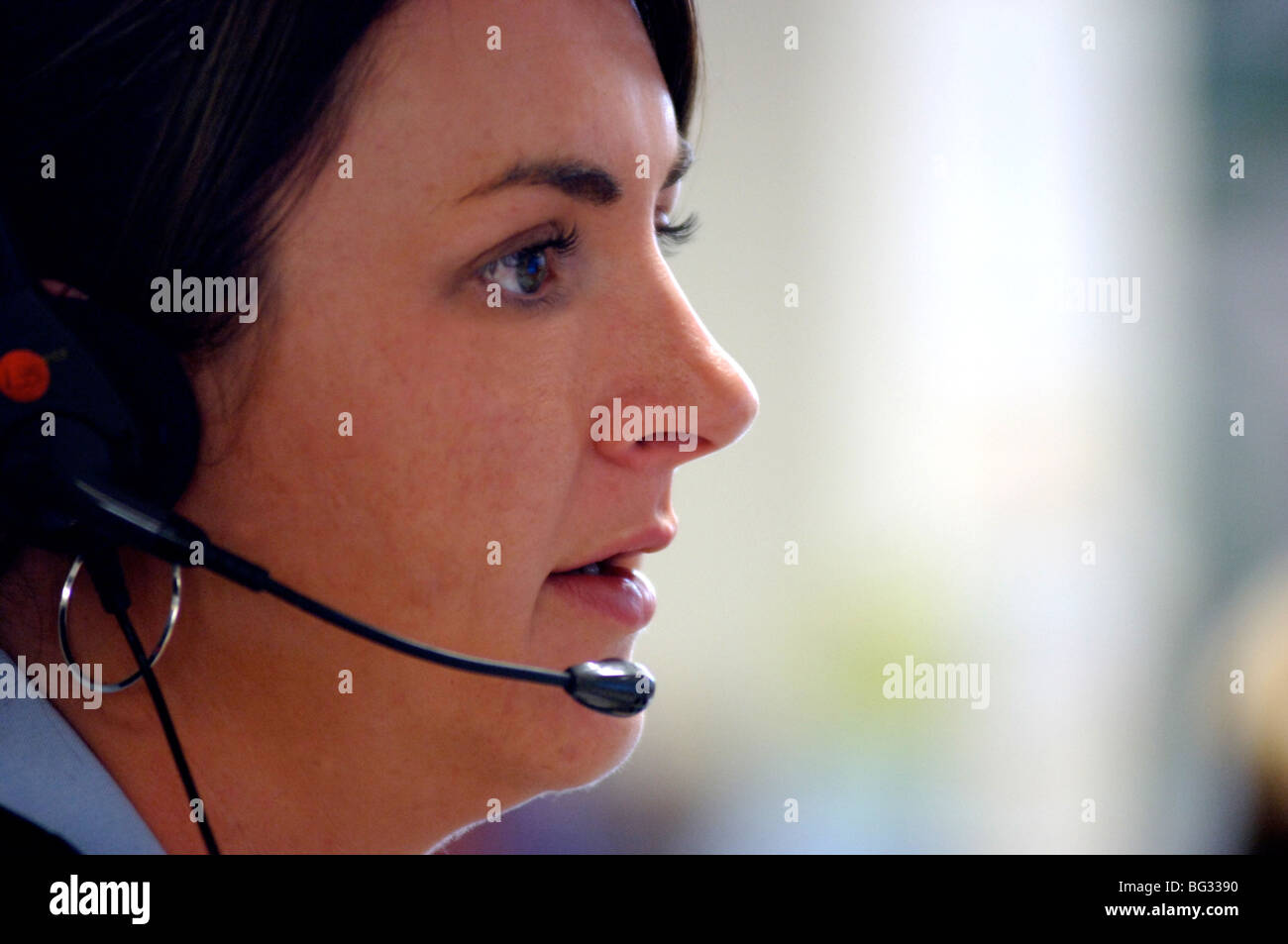 Royalty free photograph of customer helpline assistant talking to ...