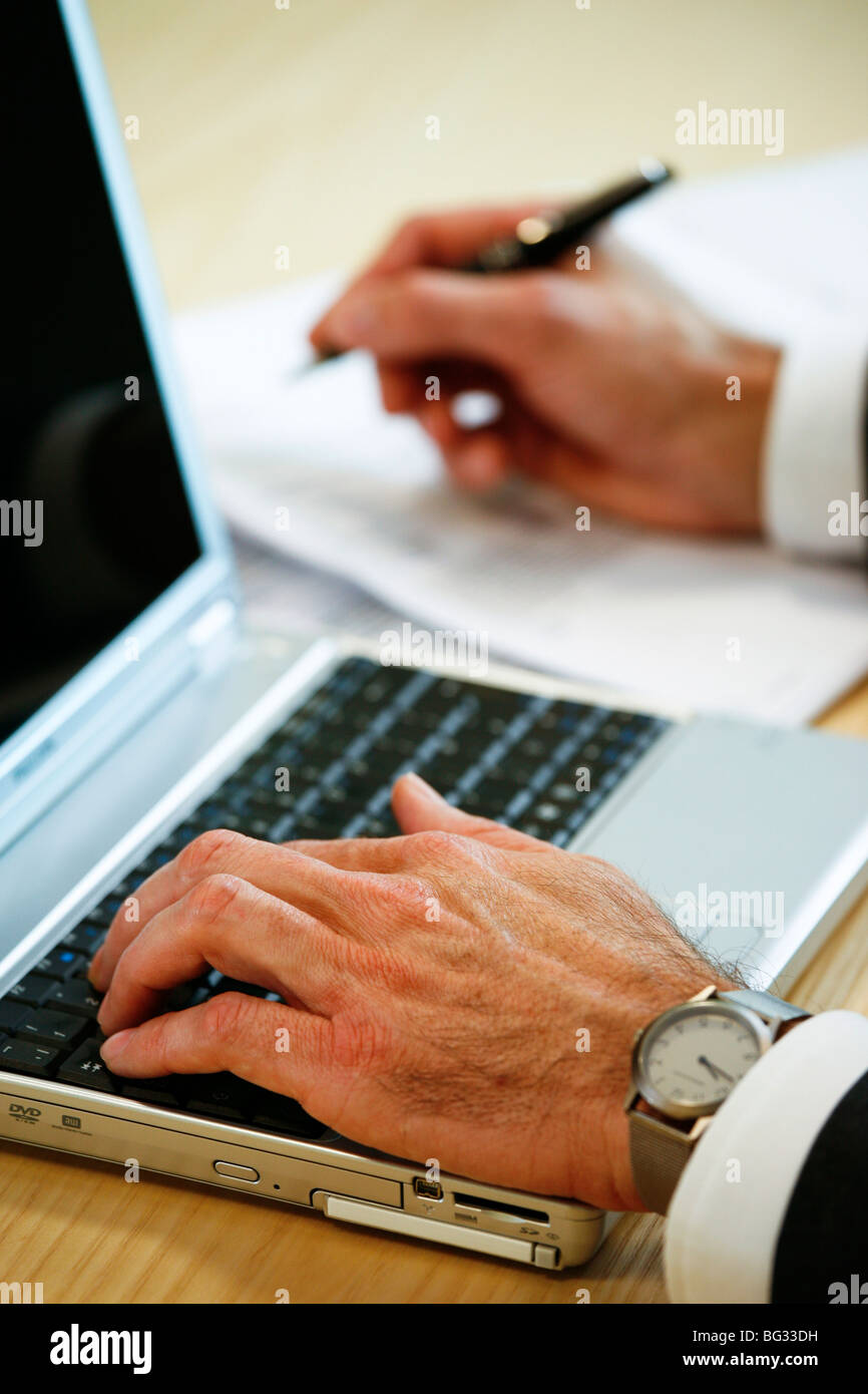 Male working computer laptop hi-res stock photography and images - Alamy
