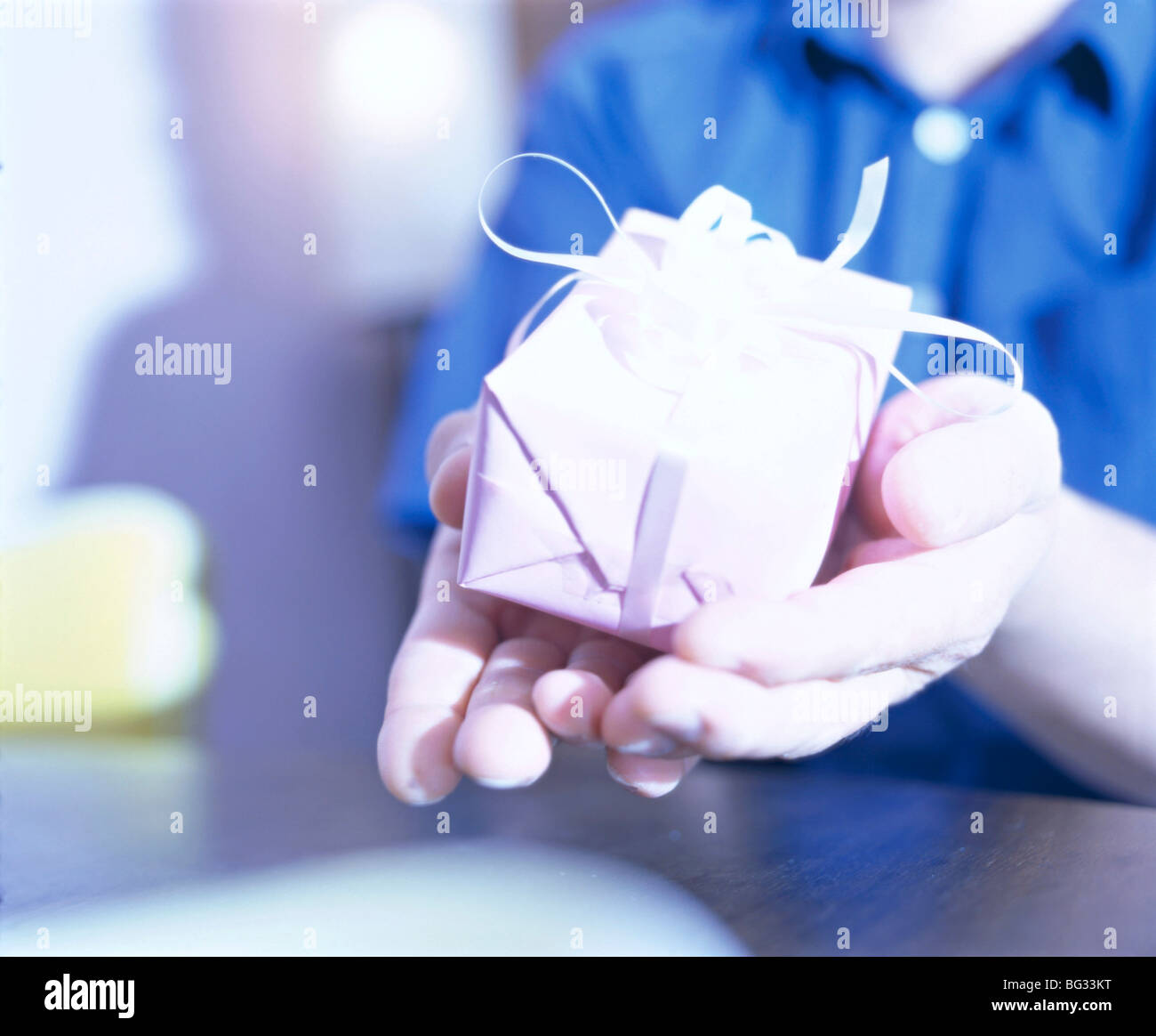 man with little present Stock Photo - Alamy