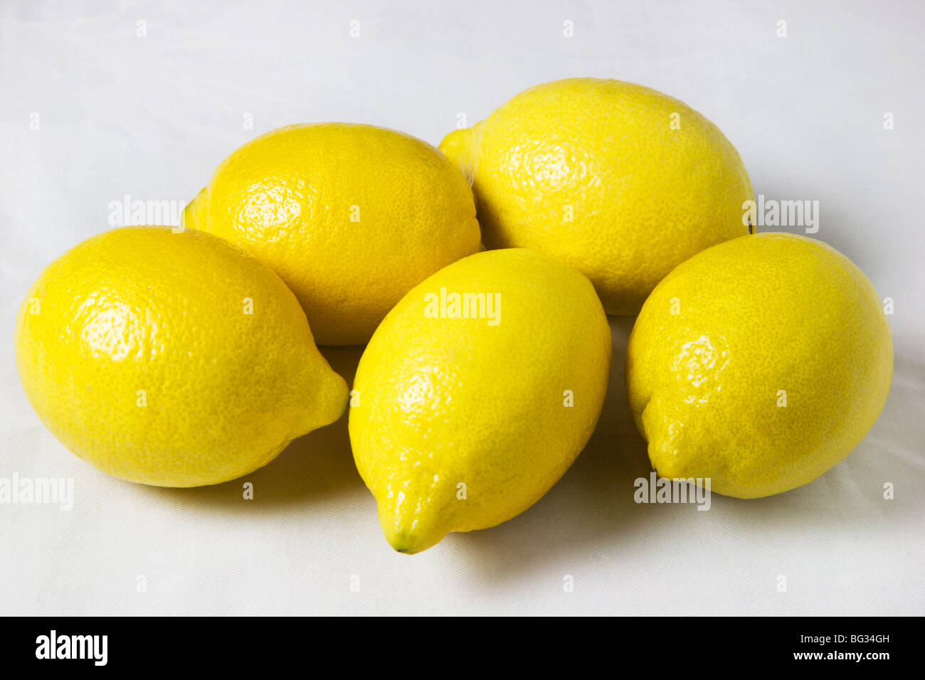 Five Lemons on a White Background Stock Photo - Alamy