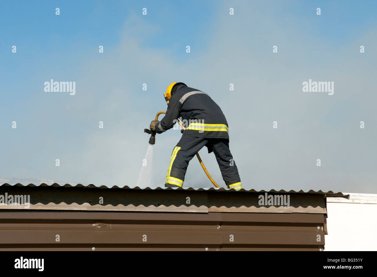 Firefighter roof hi-res stock photography and images - Alamy